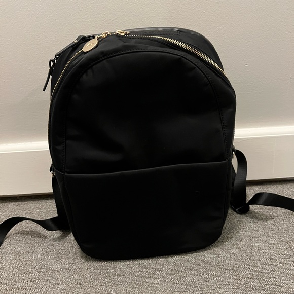 Lo & Sons | Bags | Lo Sons Sleek Black Backpack With Gold Zippers ...
